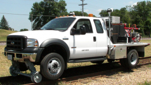 How Hi-Rail Pickup Trucks Work | The Daily Drive | Consumer Guide®